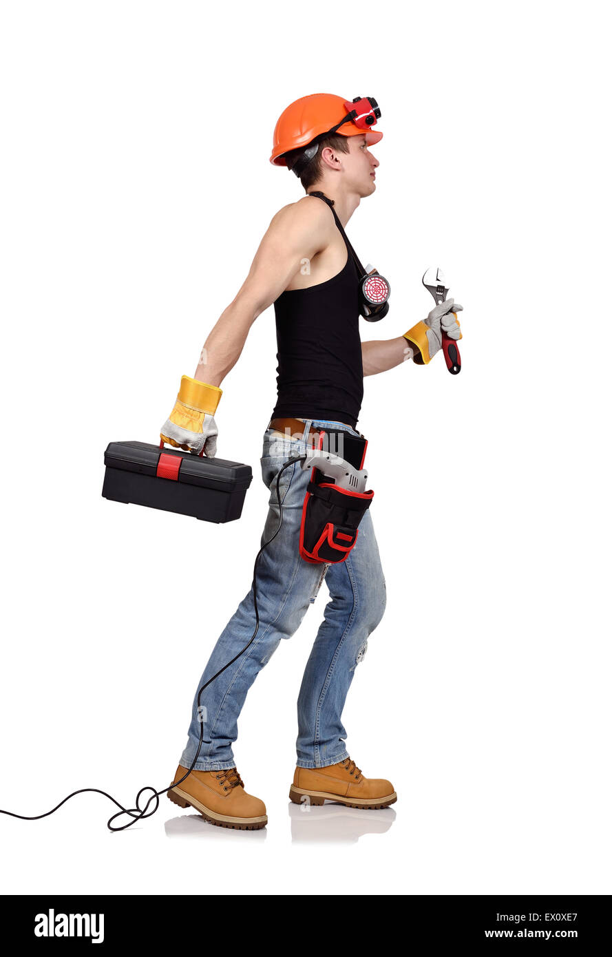 worker with toolbelt and wrench walking on a white background Stock ...