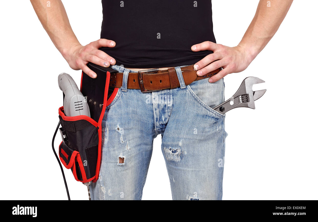 worker with toolbelt and wrench against white background Stock Photo ...