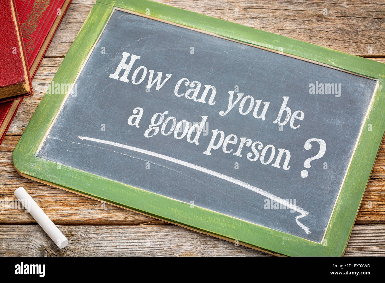 How can you be a good person? An inspirational question on a blackboard ...