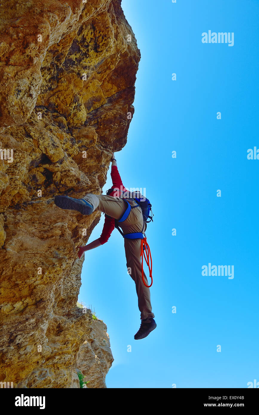 young climber with backpack fell from a cliff Stock Photo - Alamy