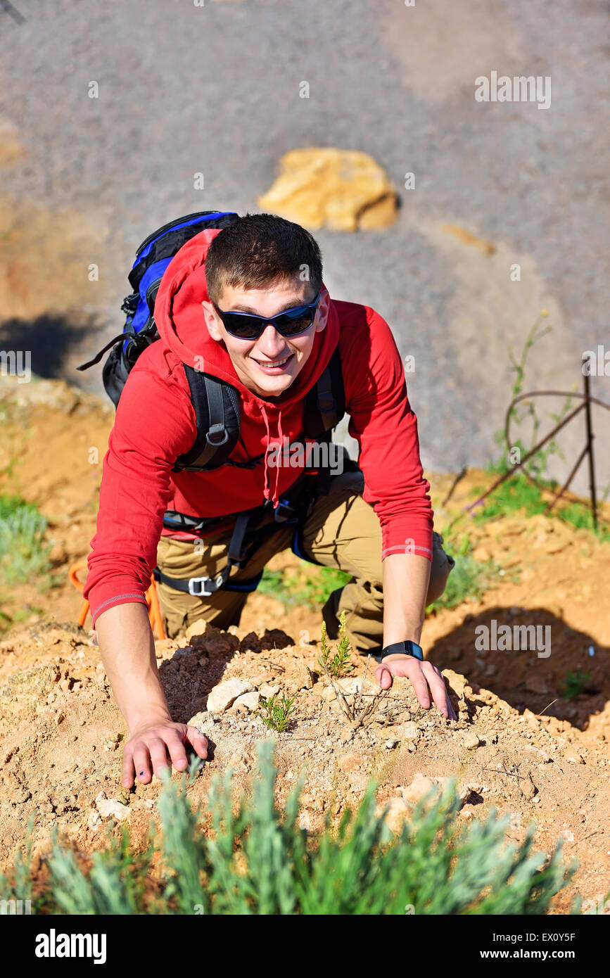 rock climber climbs on rock, extreme concept Stock Photo - Alamy