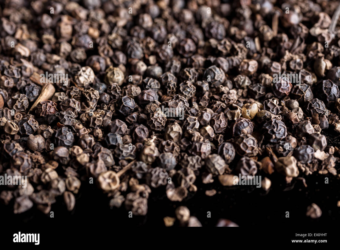 Scattered black pepper Stock Photo - Alamy