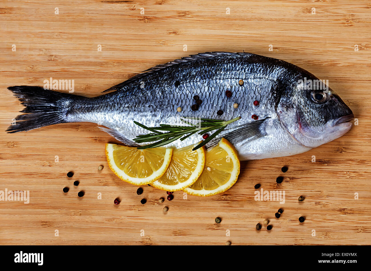 Raw uncooked fish dorado hi-res stock photography and images - Alamy