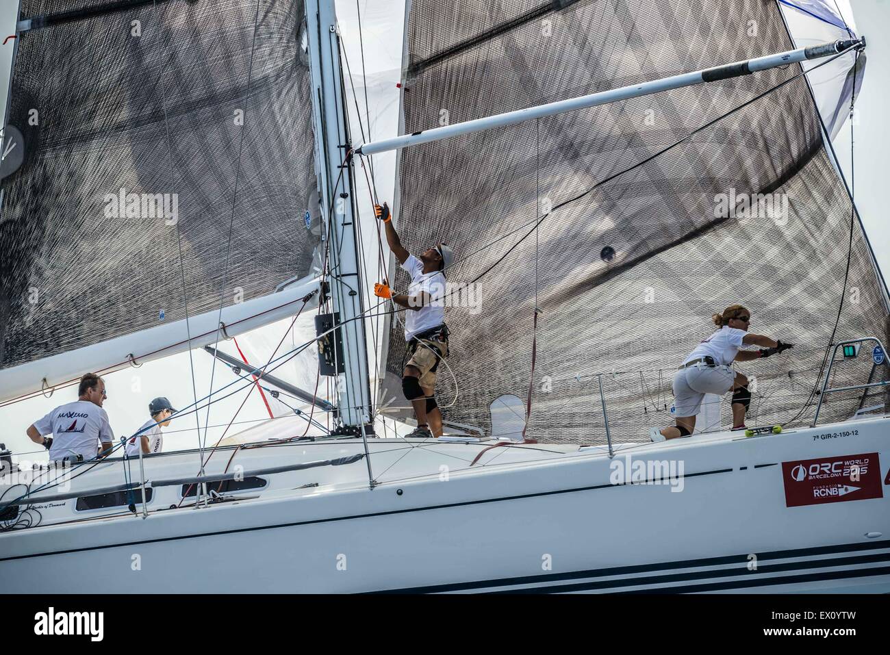 Barcelona, Catalonia, Spain. 3rd July, 2015. The crew of the 'Maximo' (ESP) reaps the spinnaker ...