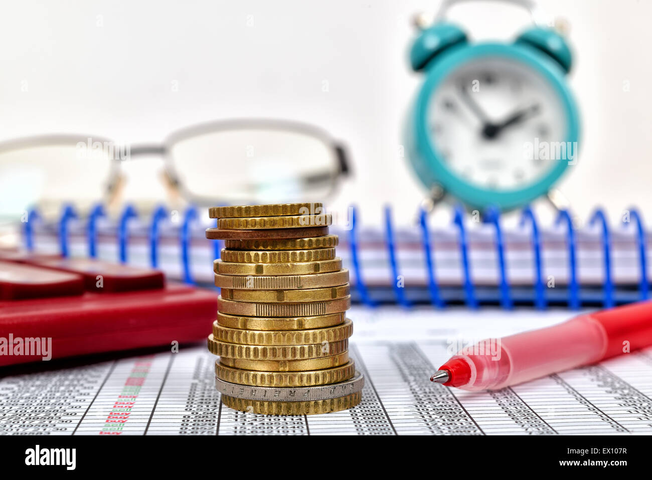 stack of euro coins on financial report Stock Photo - Alamy
