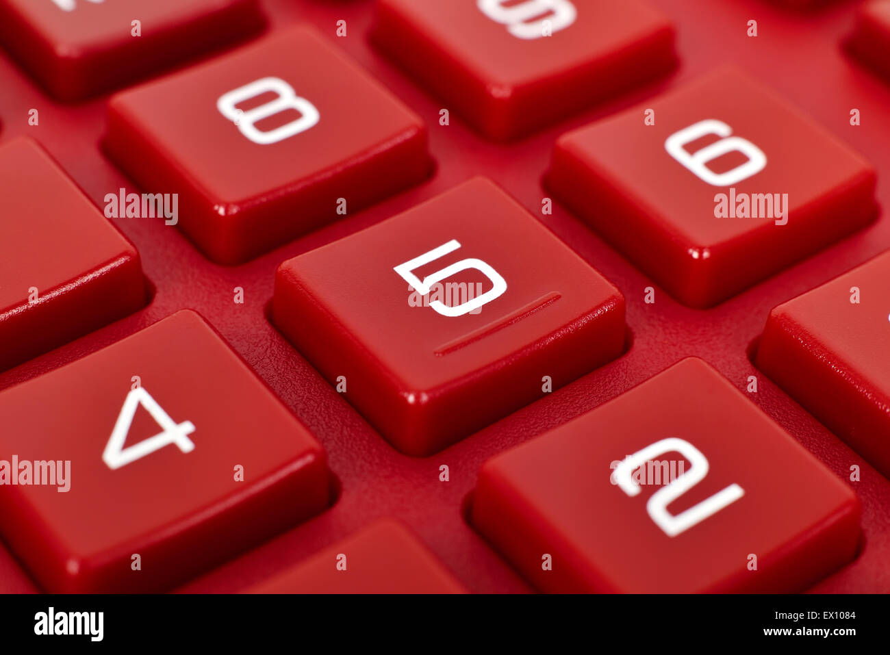 number on red calculator, extra close up Stock Photo - Alamy
