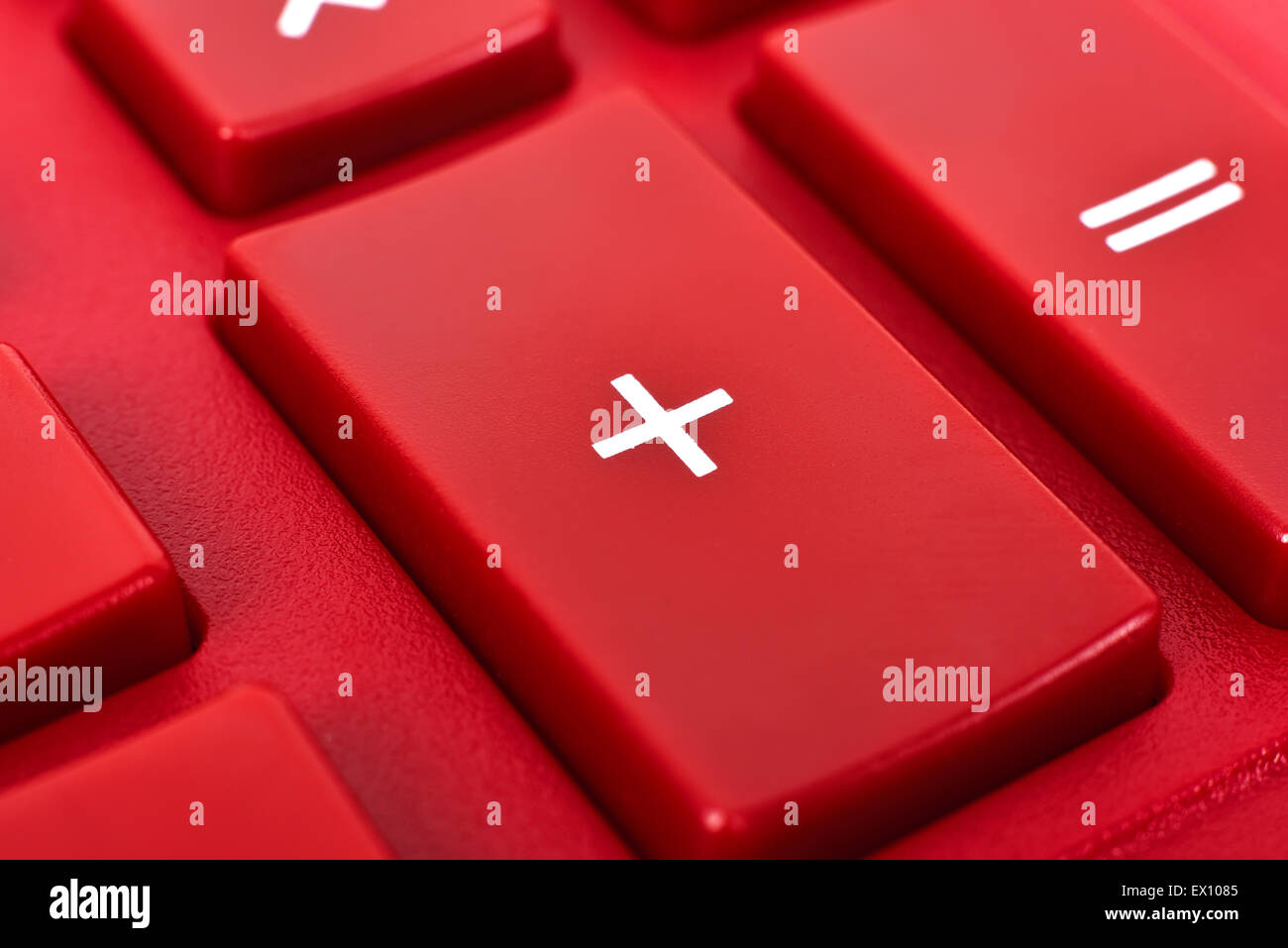 Calculator close-up shot focus on sum button Stock Photo - Alamy
