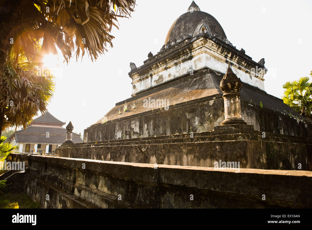Vat Visounnarath and That Makmo (Marmo Stupa) at sunset. Luang Prabang ...