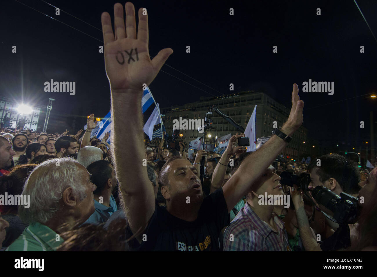 Athens, Greece. 3rd July, 2015. A protester has the word OXI(no ...
