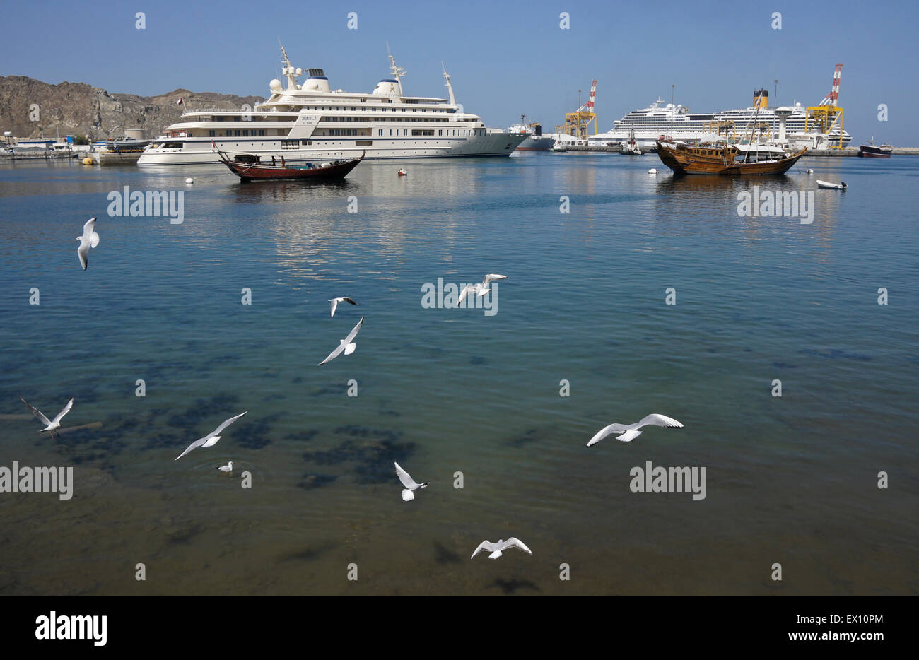 "Al Said" (sultan's yacht) and cruise ship in port, Mutrah, Muscat ...