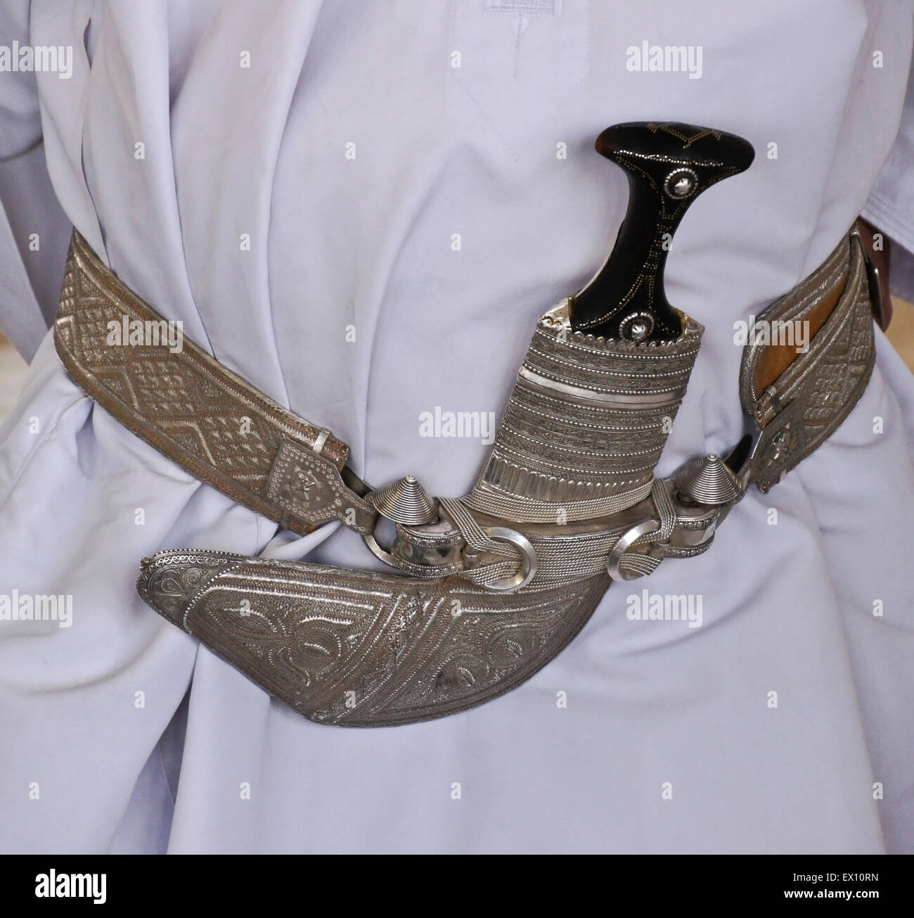 Silver belt and khanjar (dagger) worn by Bedu man, Sinaw, Sultanate of ...
