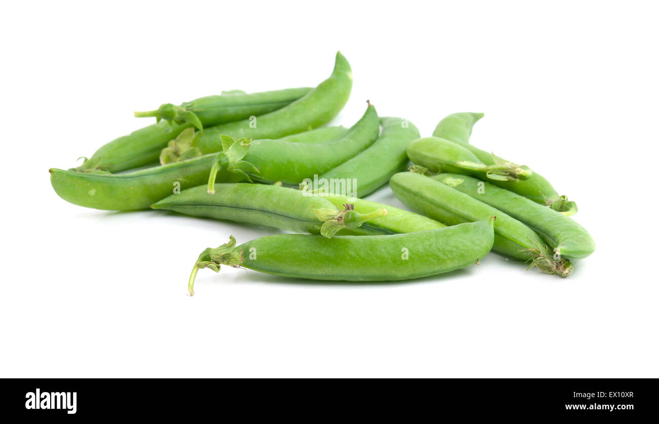 freshly green sugar snap peas on white background Stock Photo - Alamy