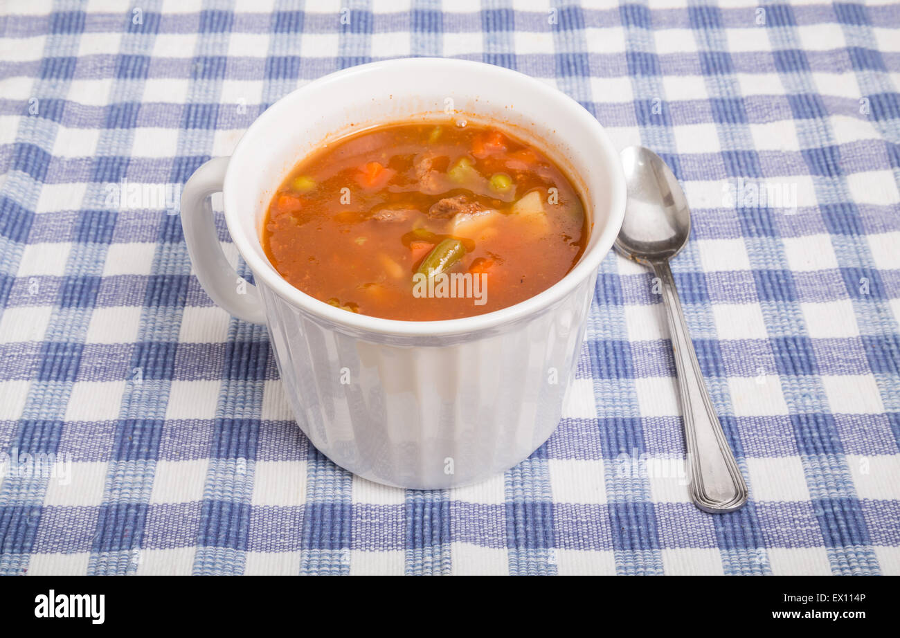 A hot mug of beef and vegetable soup Stock Photo - Alamy