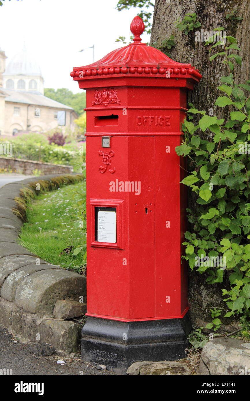 A Victorian red pillar box of the Penfold type in Buxton Derbyshire ...