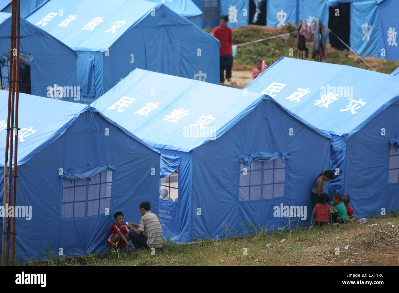 Refugees from Kokang, in Myanmar's Shan State, are seen near the China ...