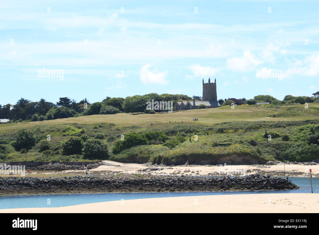 st euny church overlooking lelant golf course on a sunny summer day in ...