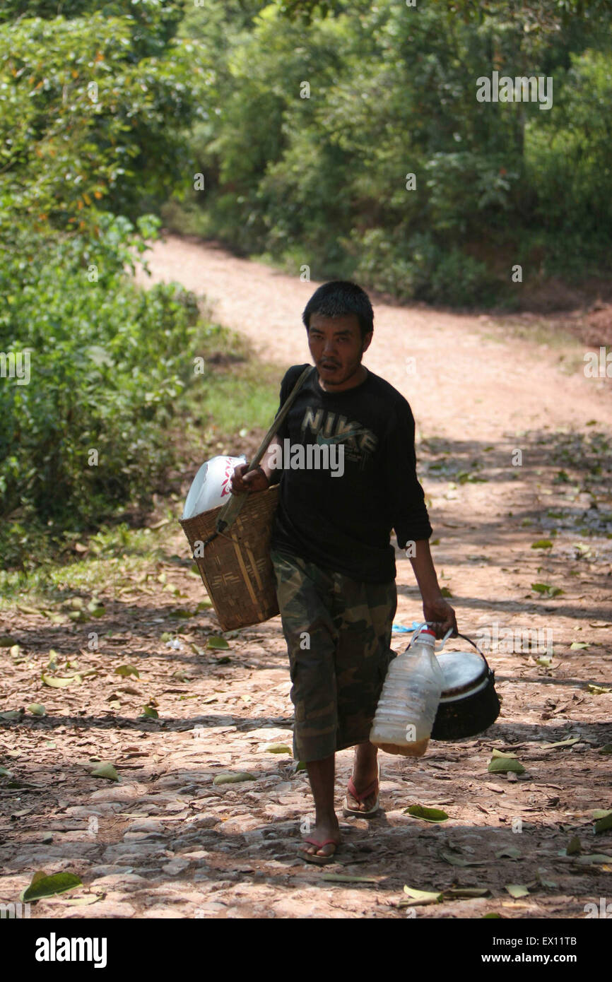 A refugee from Kokang, in Myanmar's Shan State, is seen near the China ...