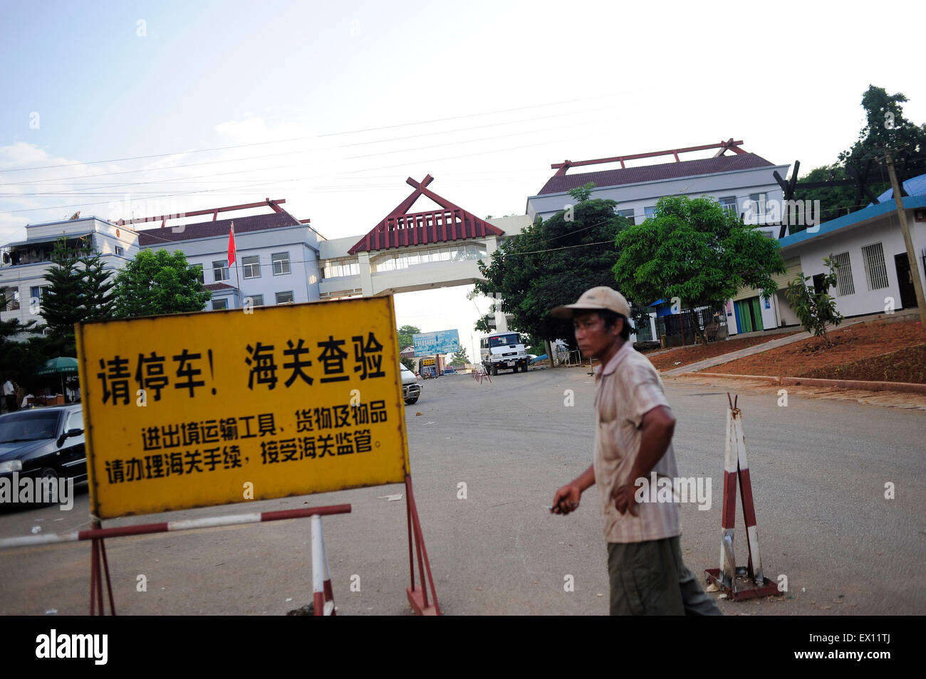 Refugees from Myanmar's Wa State ride on a tractor to the China-Myanmar ...