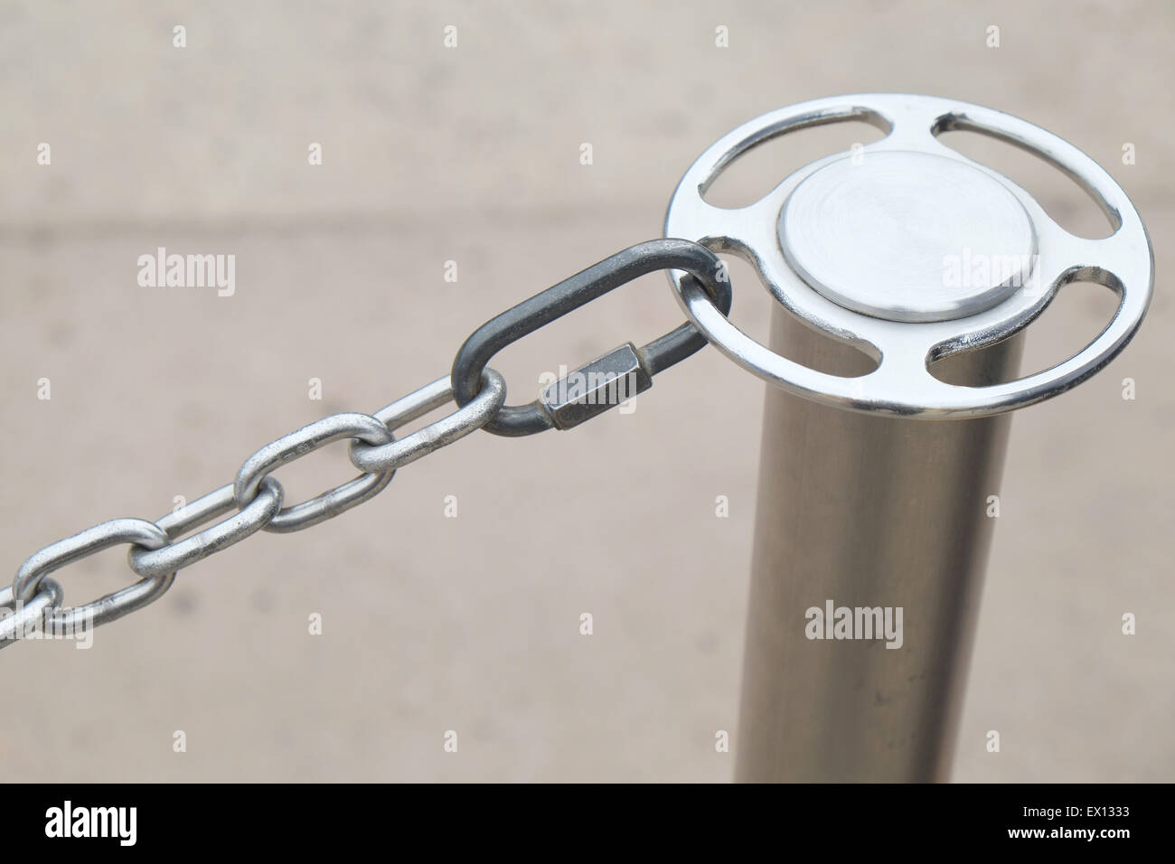 Post and chain serving as a barrier to control people in a line Stock ...