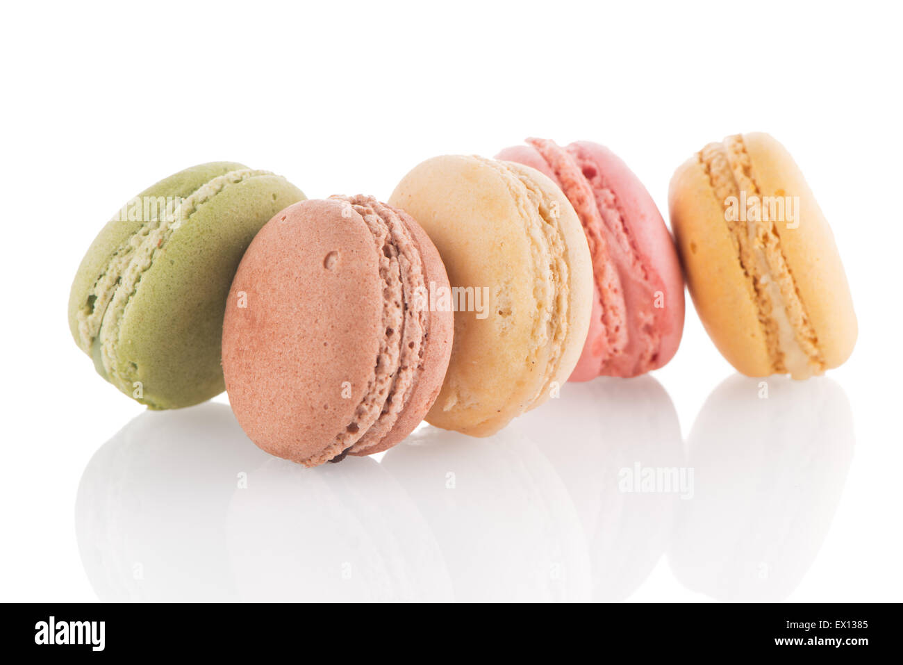 Colorful French Macarons on the white background Stock Photo - Alamy