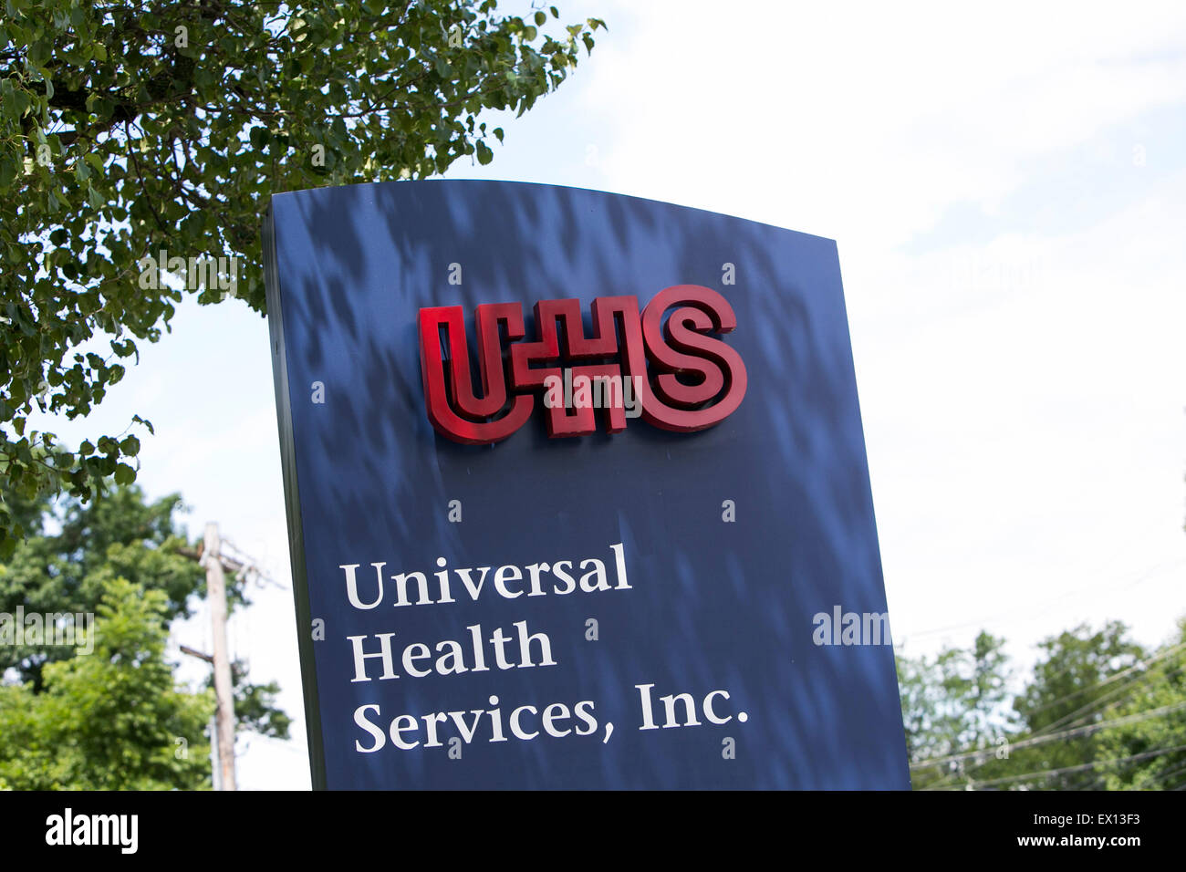 A logo sign outside the headquarters of Universal Health Services, Inc ...