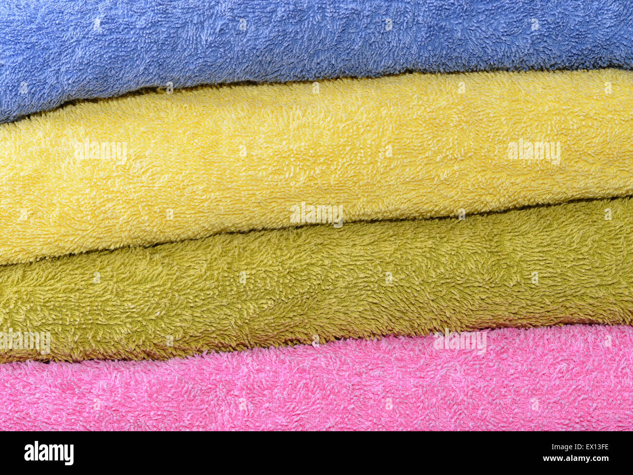 Close up of different color bath towels Stock Photo - Alamy
