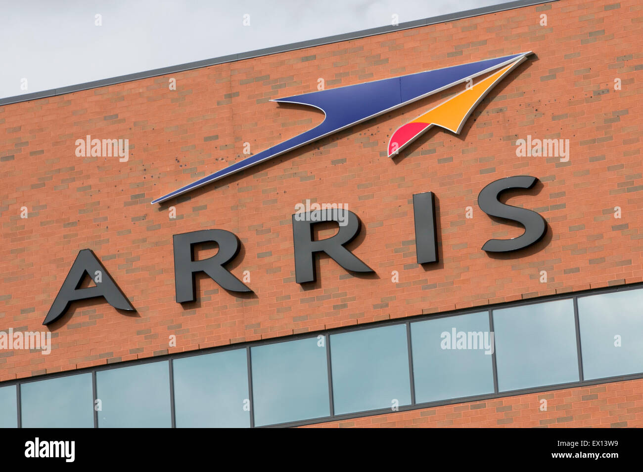 A logo sign outside of a facility occupied by ARRIS Group Inc., in ...