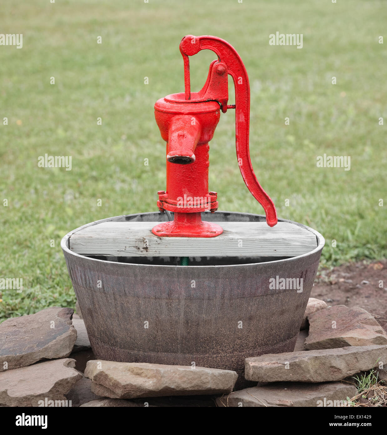 Vintage water pump outdoor display Stock Photo - Alamy