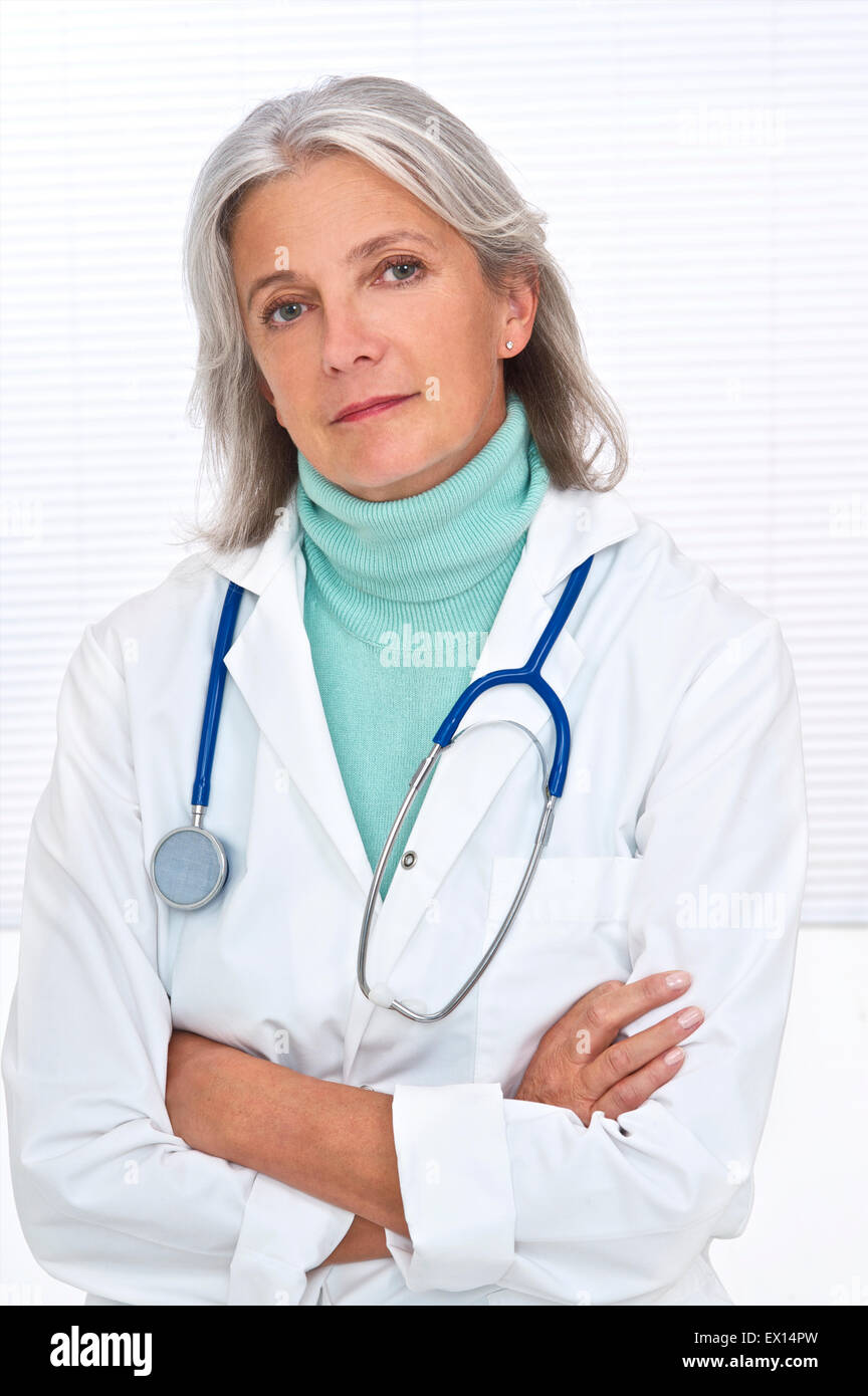 Female doctor folding arms hi-res stock photography and images - Alamy
