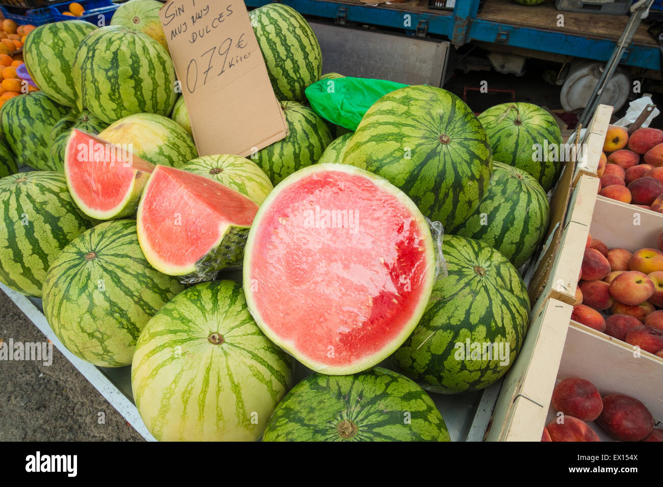 Fresh watermelons on display at a street market stall Stock Photo - Alamy