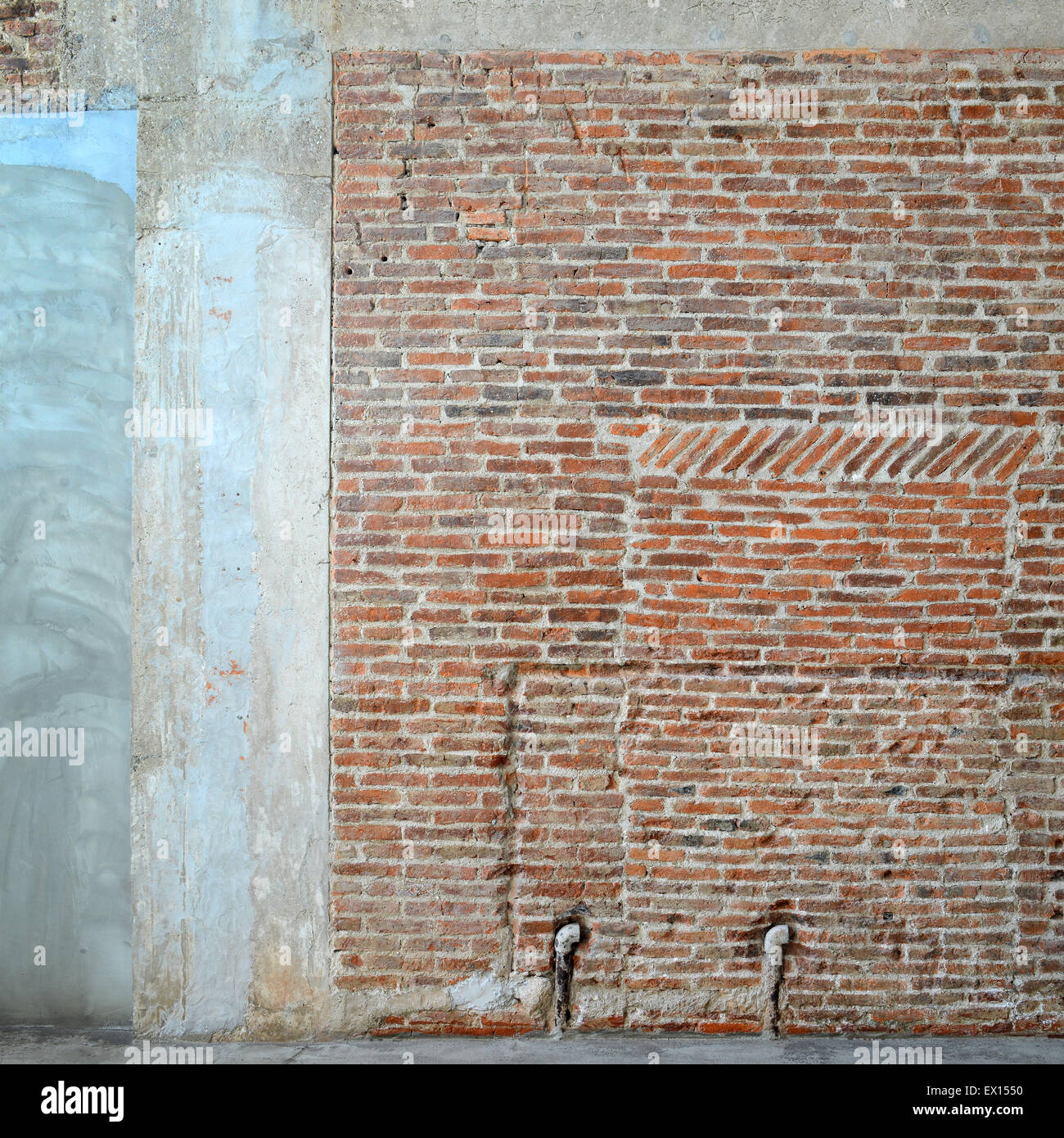 Old brick wall and pipe on concrete texture, background for decorate ...