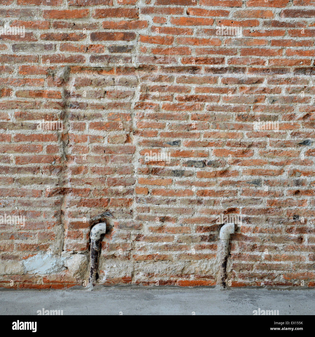 Old brick wall and pipe on concrete texture, background for decorate ...