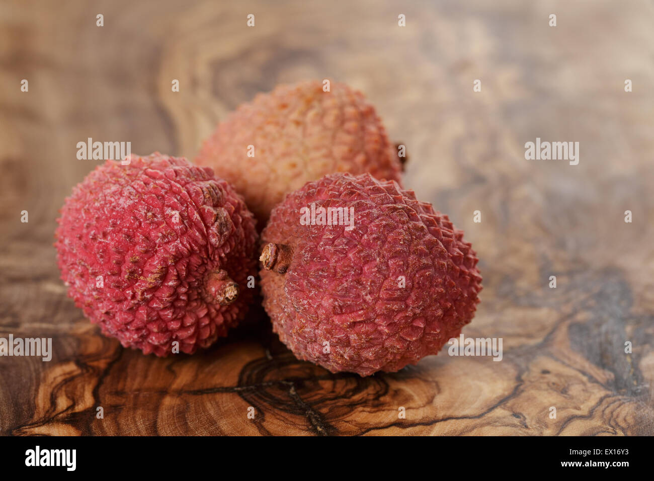 ripe lychees in on table Stock Photo - Alamy