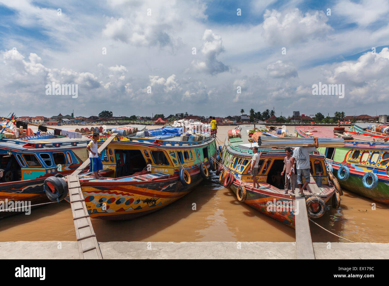 Wooden cargo and passenger boats on Musi River, Sumatra, Indonesia ...