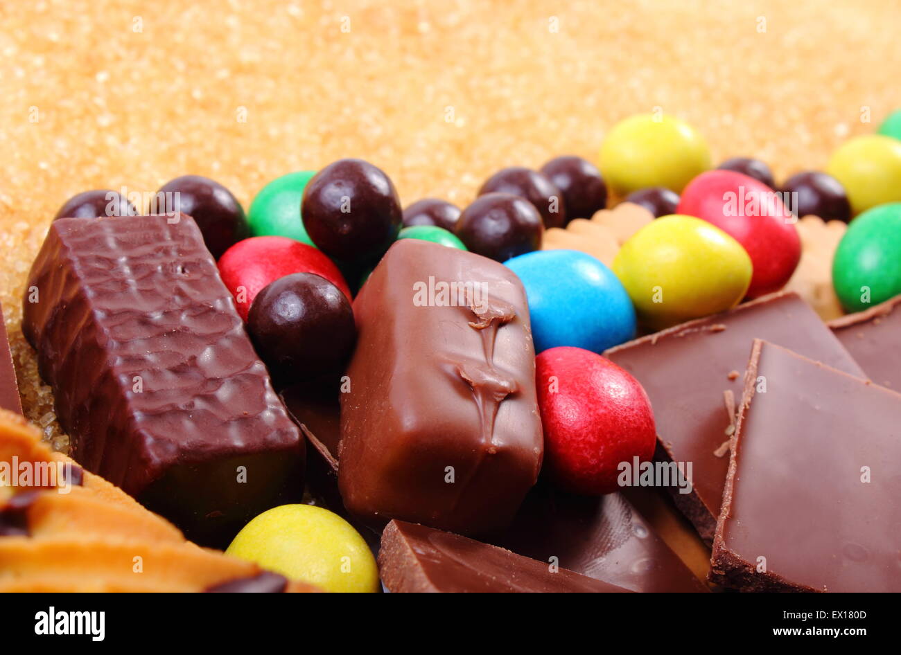 A lot of candies and cookies with brown cane sugar, too many sweets ...