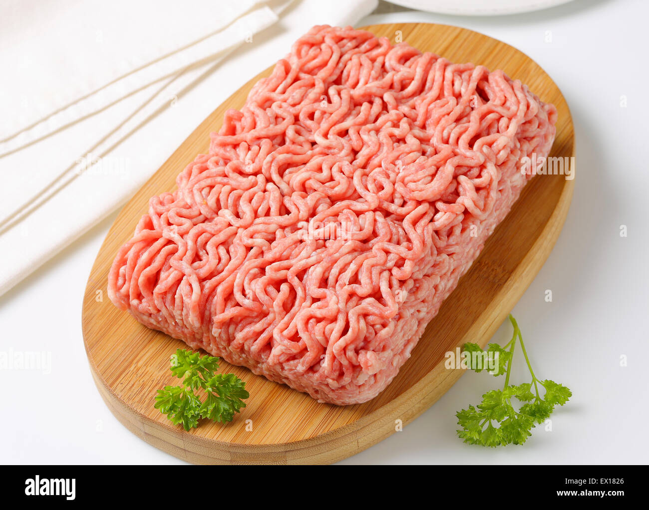 Raw ground pork on cutting board Stock Photo - Alamy