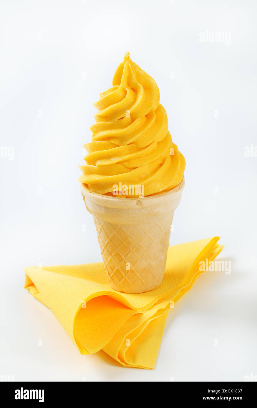 Swirl of soft serve ice cream in a cone Stock Photo - Alamy