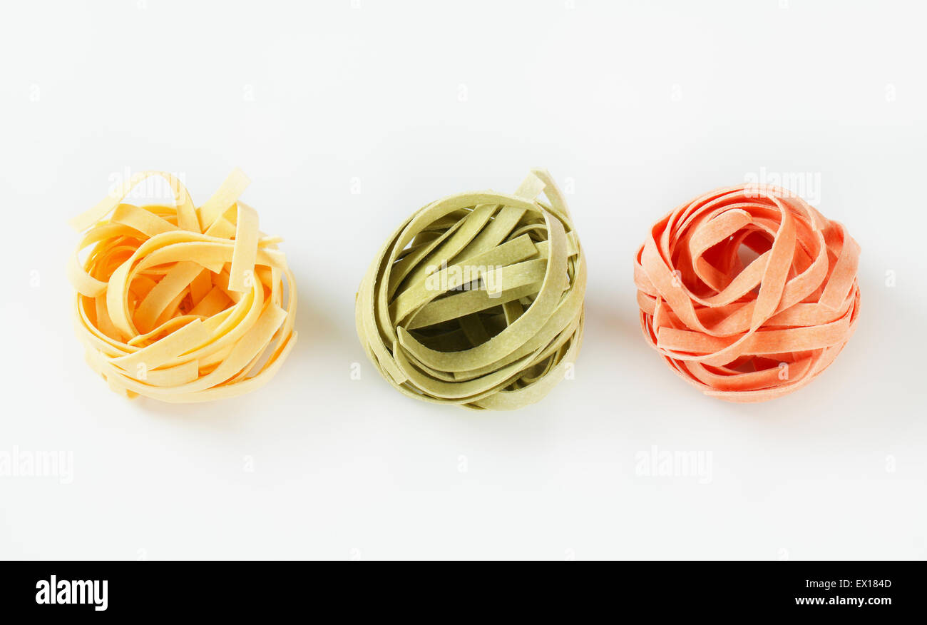 Bundles of dried ribbon pasta Stock Photo - Alamy