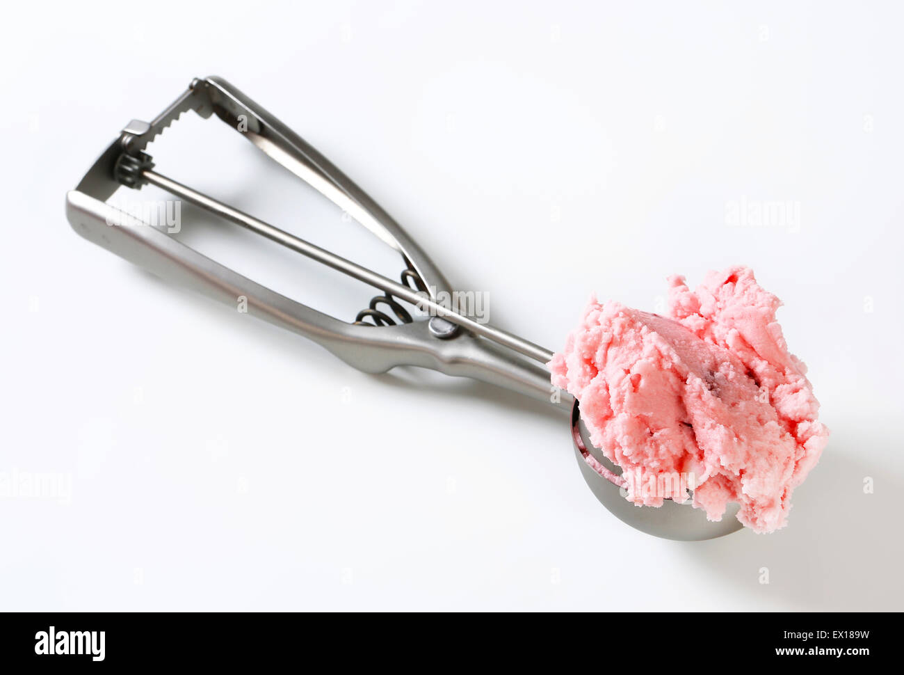 Scoop of pink ice cream - studio shot Stock Photo - Alamy