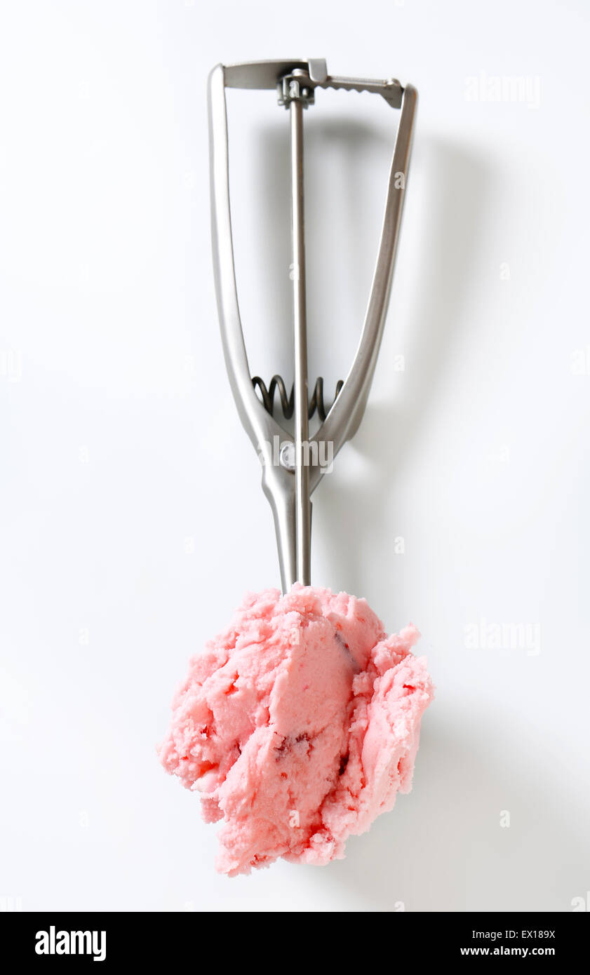 Scoop of pink ice cream - studio shot Stock Photo - Alamy