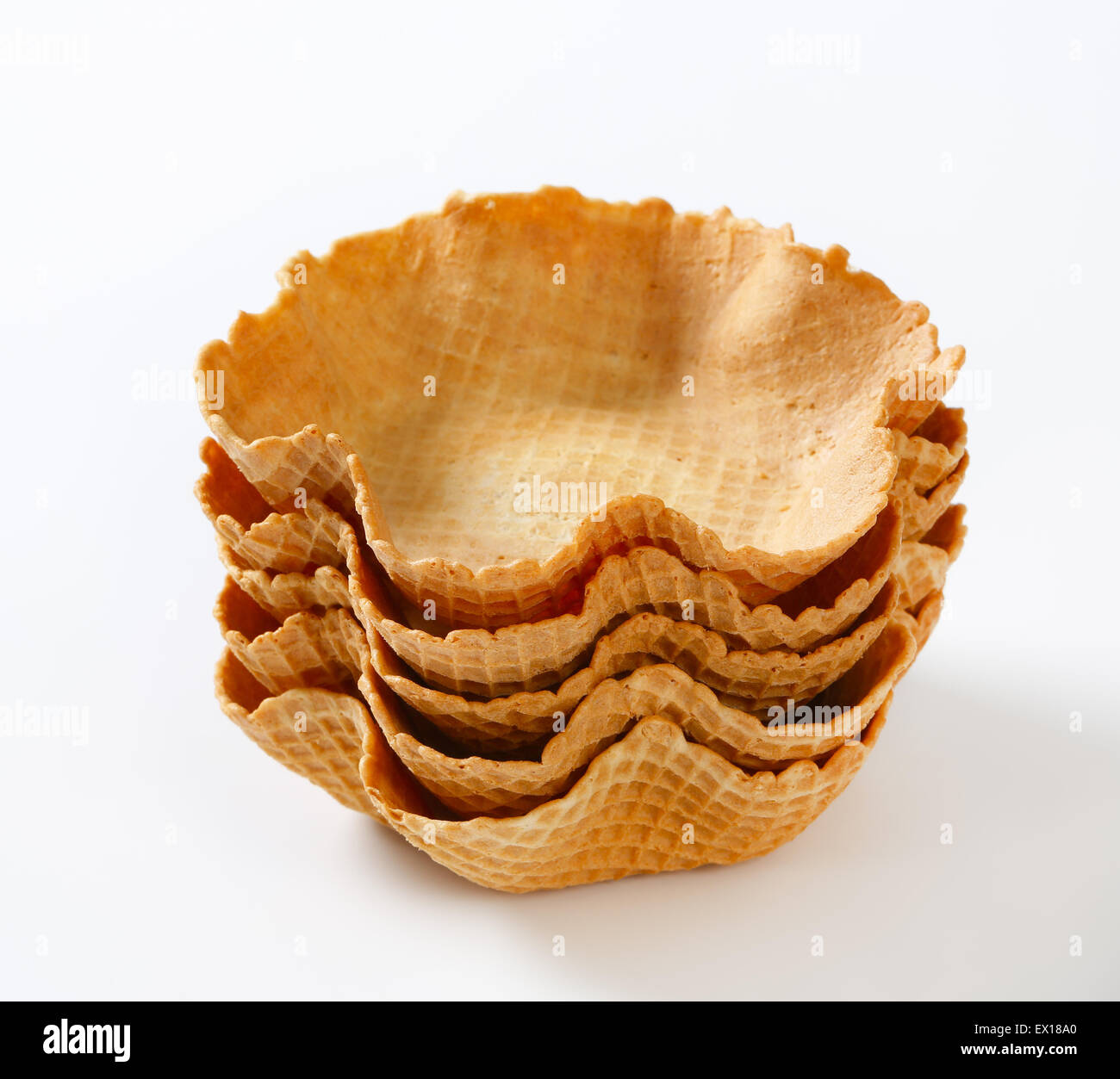 Stack of empty waffle baskets Stock Photo - Alamy