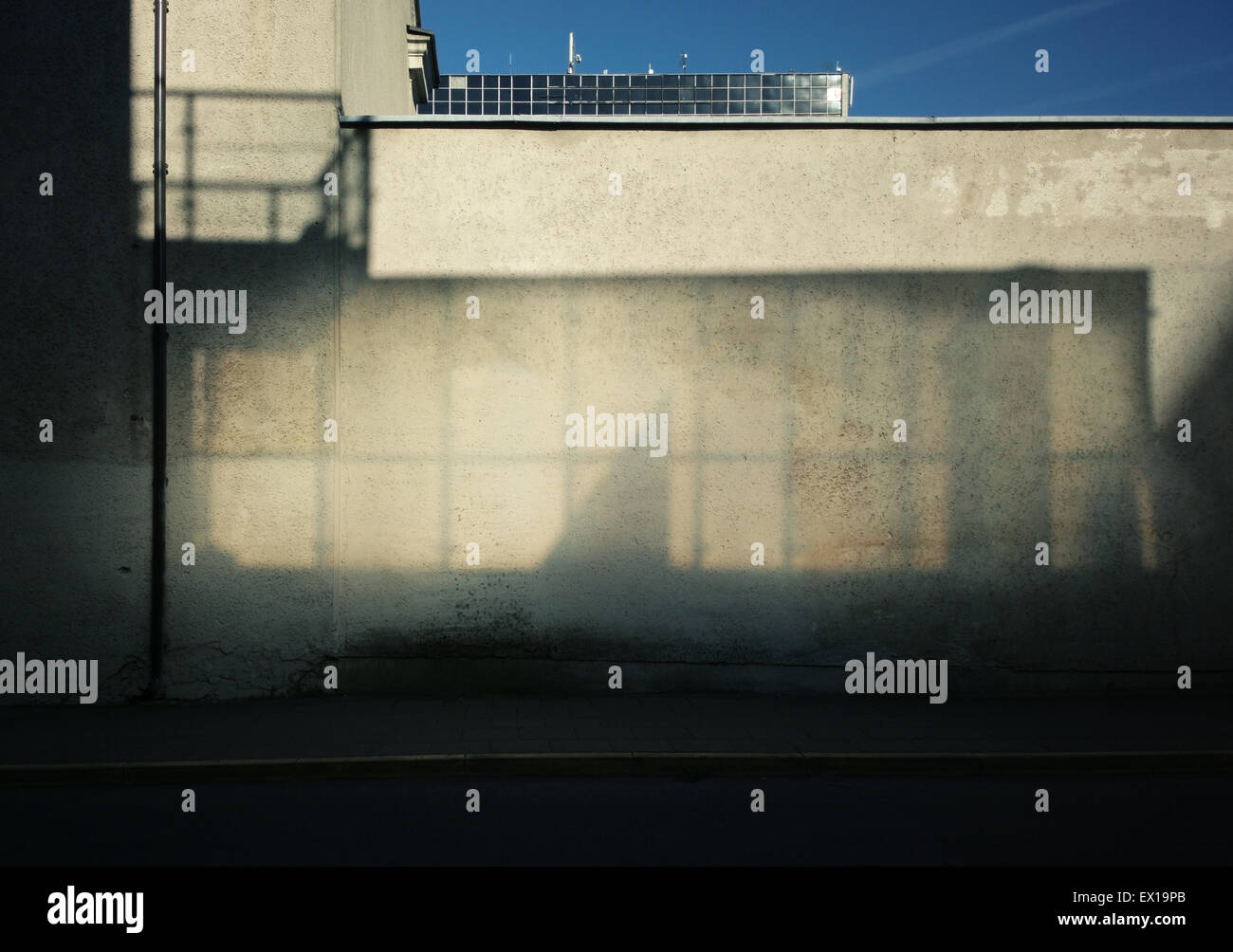 Sunlight and shadows on the wall Stock Photo - Alamy