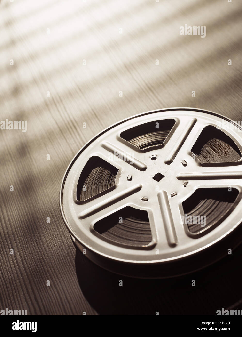 Motion picture film reel on the table Stock Photo - Alamy