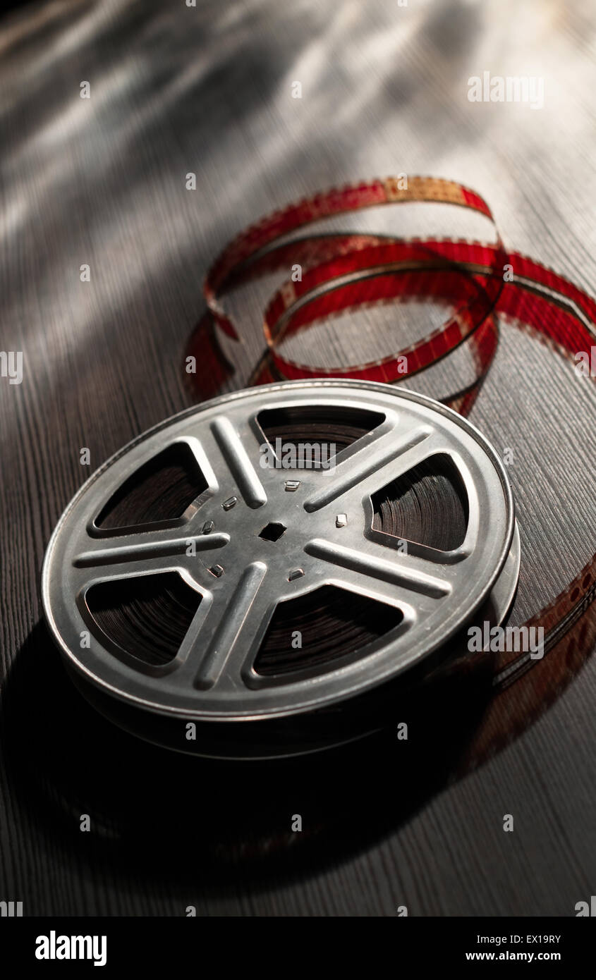 Motion picture film reel on the table Stock Photo - Alamy