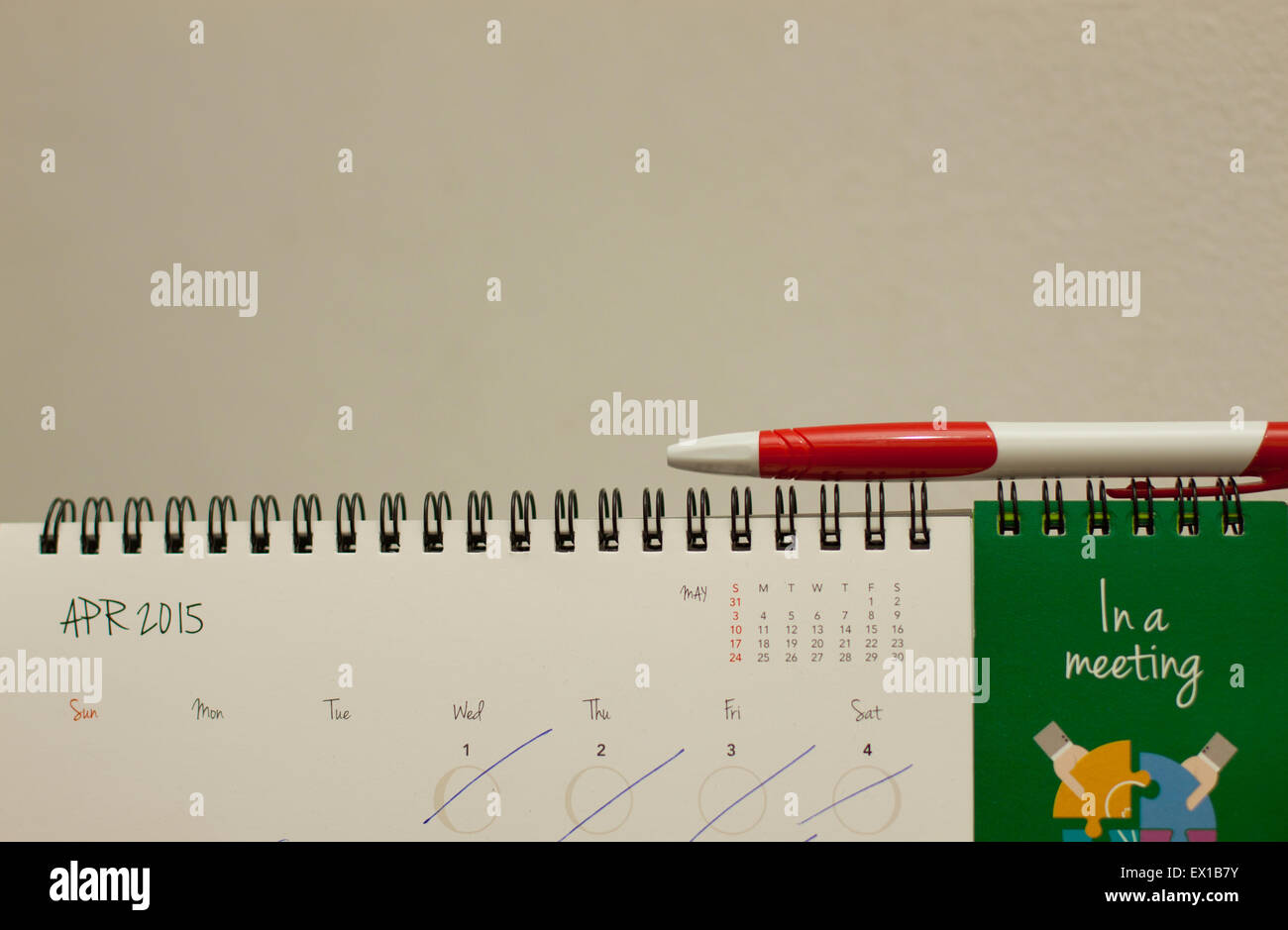 Calendar and red white pen Stock Photo - Alamy