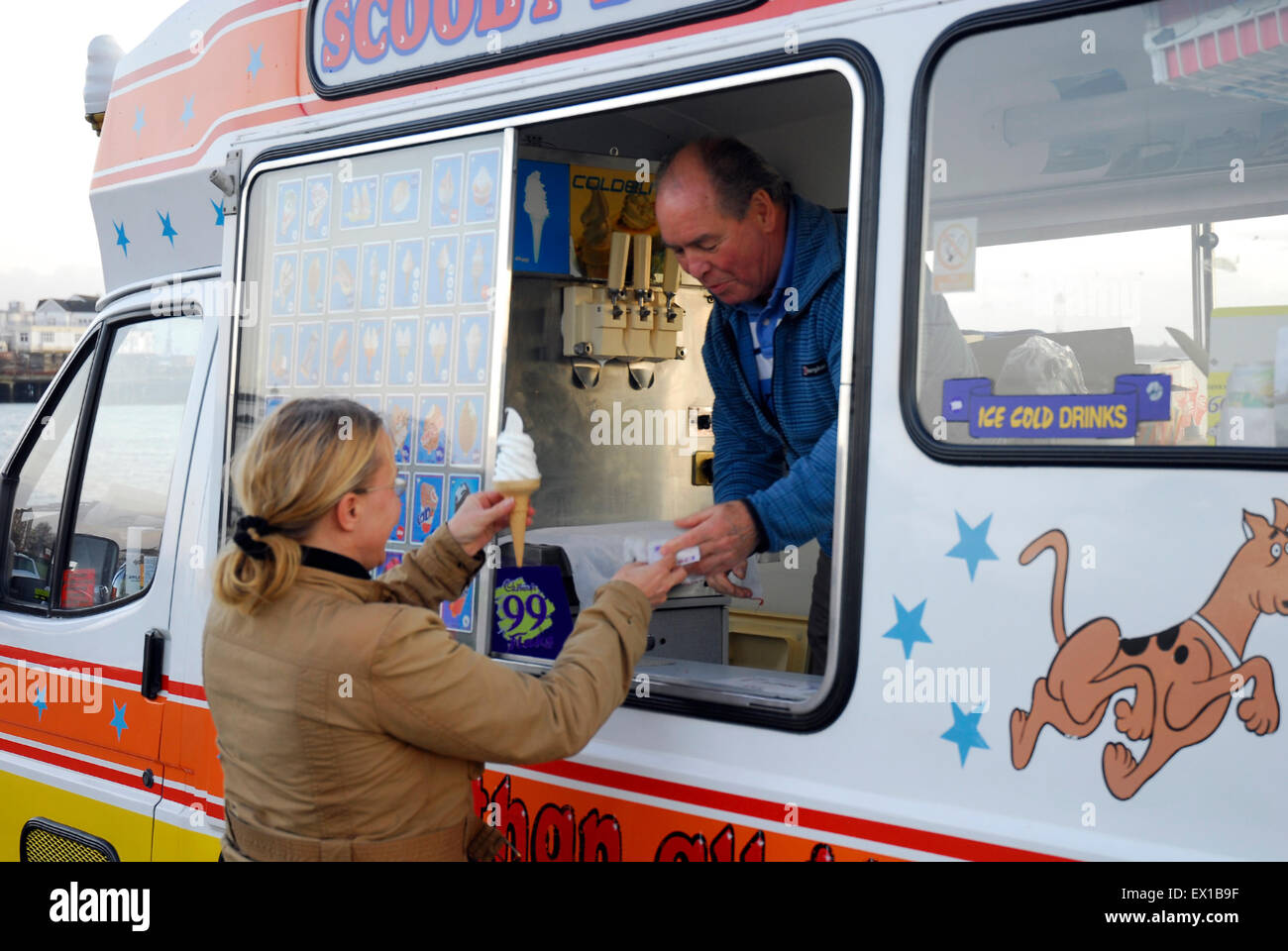 Truck driver eating while driving hi-res stock photography and images ...