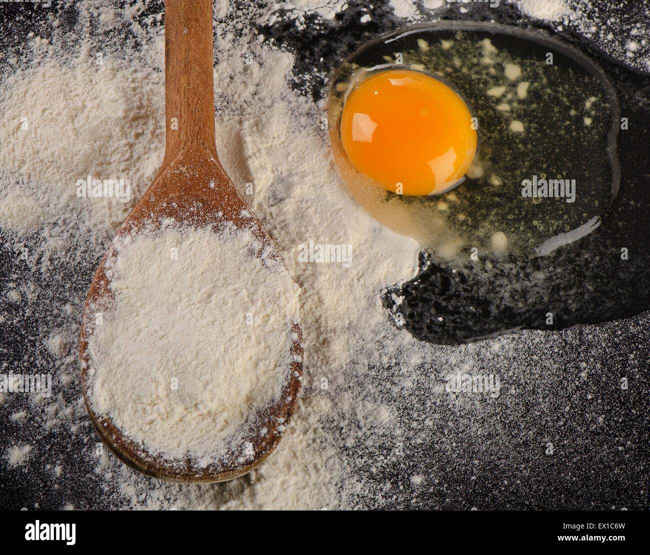 Baking ingredients with egg, eggshell and flour. Top view Stock Photo ...