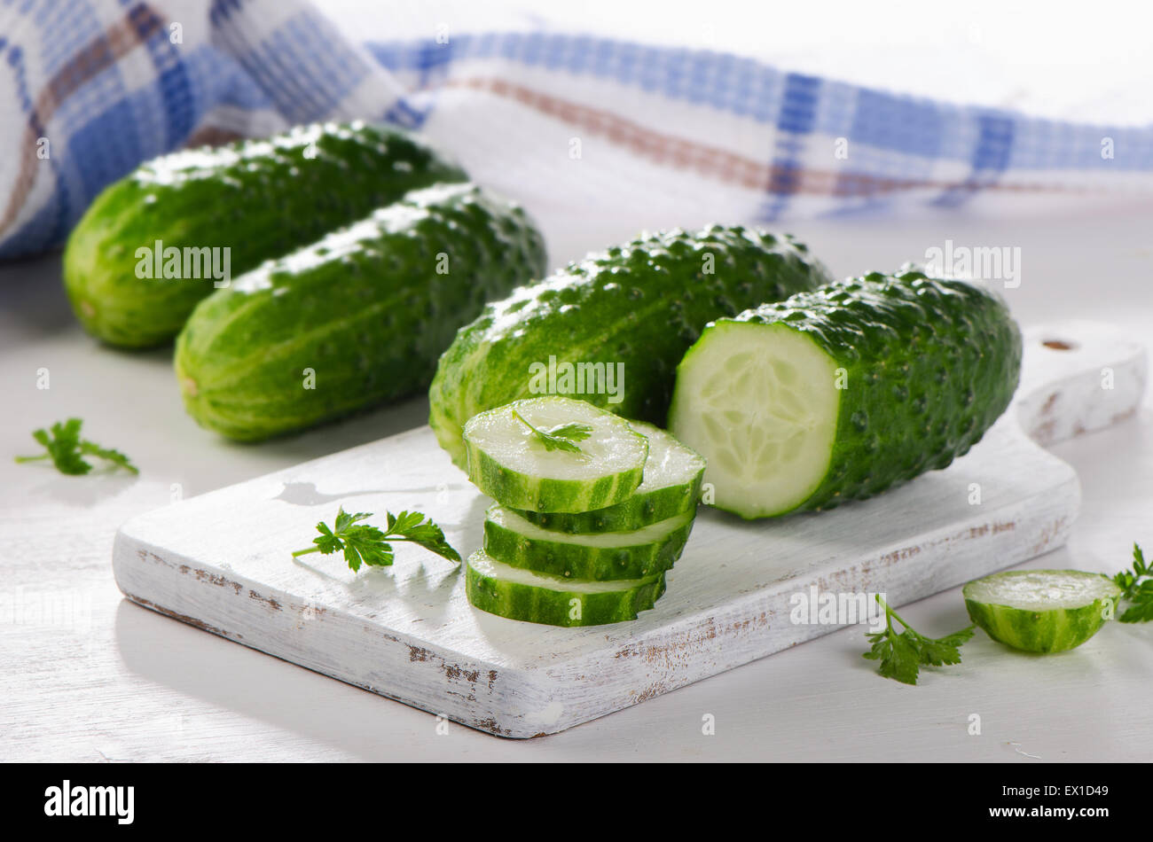 Sliced cucumber on a cutting board. Selective focus Stock Photo - Alamy