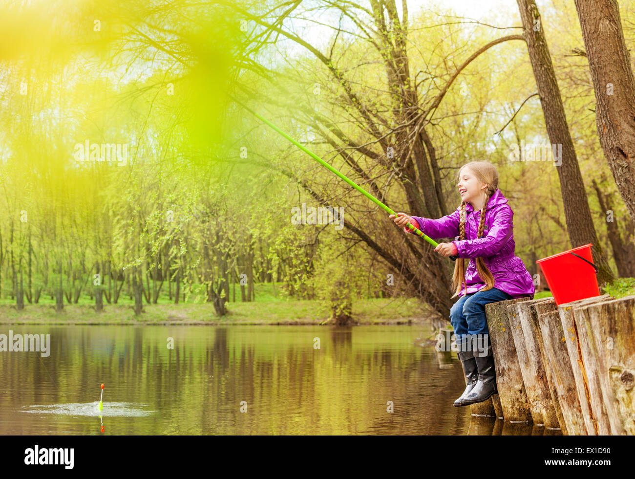 Excited small girl fishing near beautiful pond Stock Photo - Alamy Excited small girl fishing near beautiful pond Stock Photo - Alamy