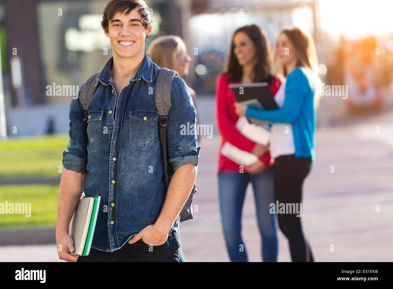 Young student boy looking at the camera after class Stock Photo - Alamy